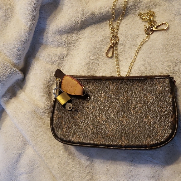 Louis Vuitton | Bags | Louis Vuitton Brown And Gold Monogram Pouch ...